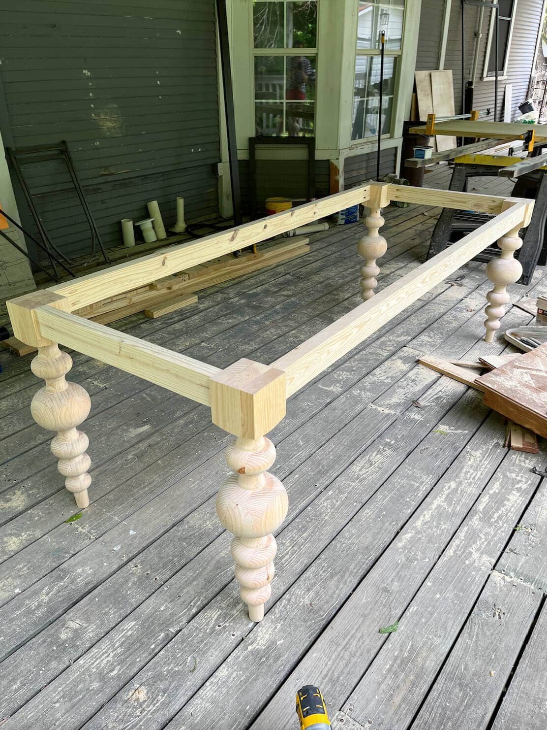 DIY Modern Turned Leg Dining Table - Renee Renovates